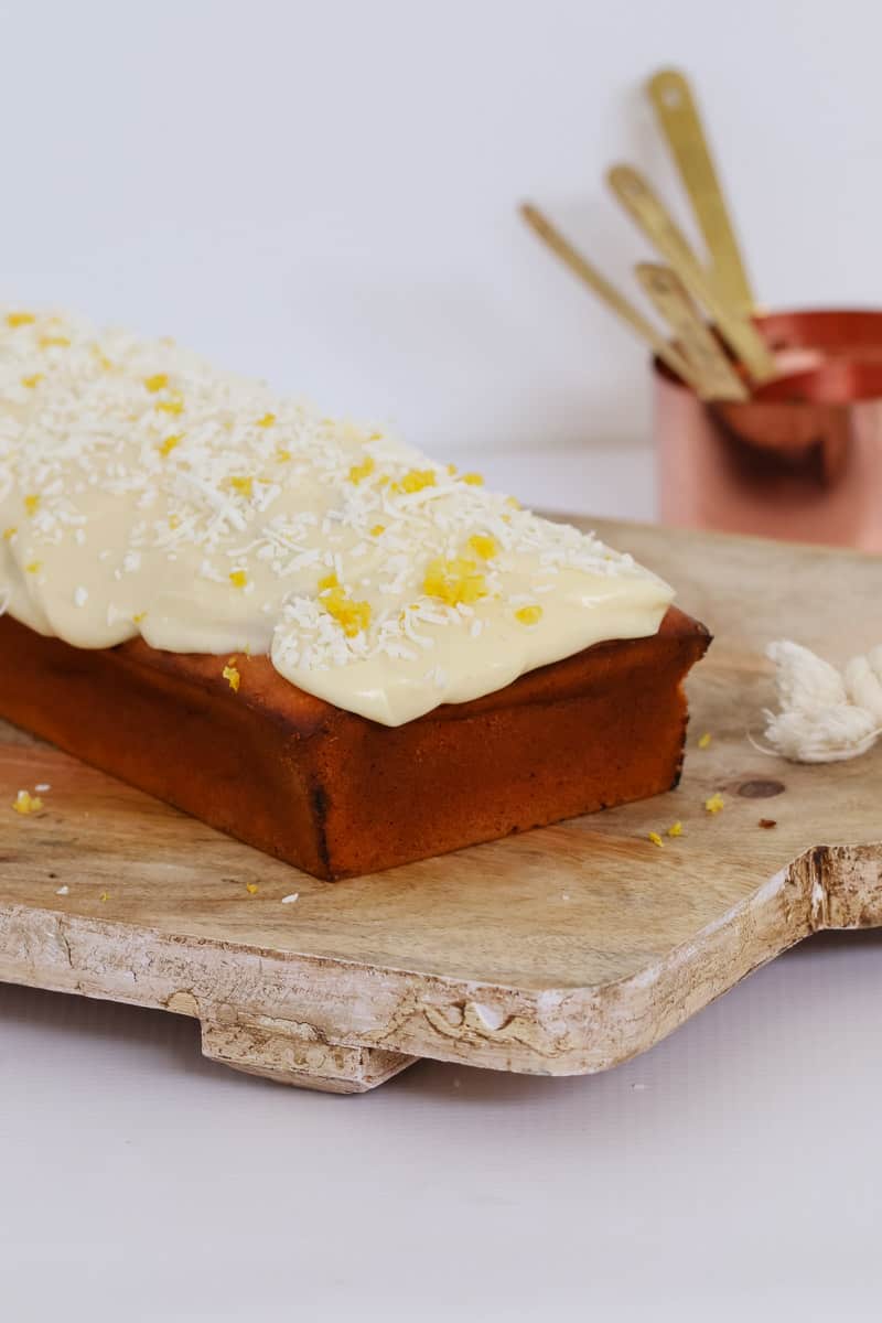 Lemon Coconut Loaf with Cream Cheese Frosting - Bake Play Smile