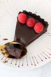 Super Easy 5 Ingredient Raspberry Chocolate Ganache Tart - Bake Play Smile