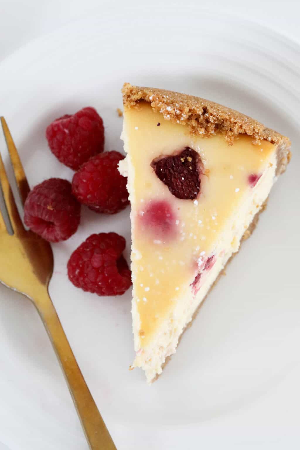 The ULTIMATE Raspberry Baked Cheesecake Recipe! - Bake Play Smile