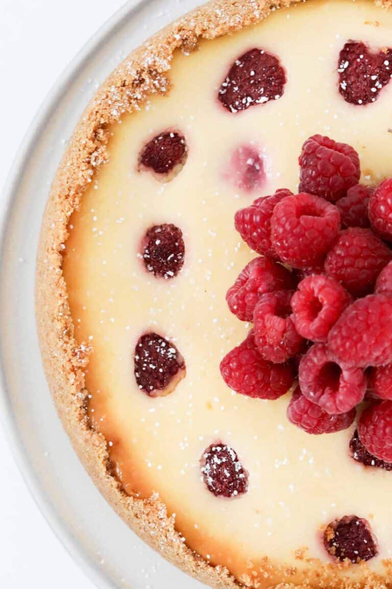 The ULTIMATE Raspberry Baked Cheesecake Recipe! - Bake Play Smile