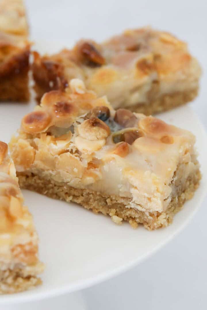 Chewy Caramel Nut Slice Recipe - Bake Play Smile