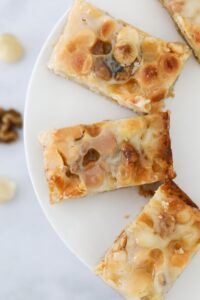 Chewy Caramel Nut Slice Recipe - Bake Play Smile